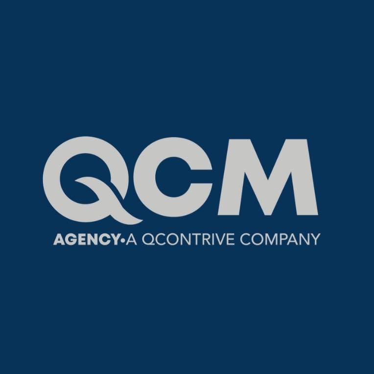 QCM logo - It's All Downtown | It's All Downtown